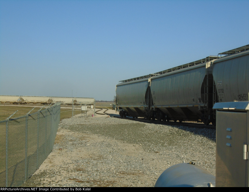 NS 6175 pulls out of Frito Lay siding with 13 cars coupled to 17 cars.